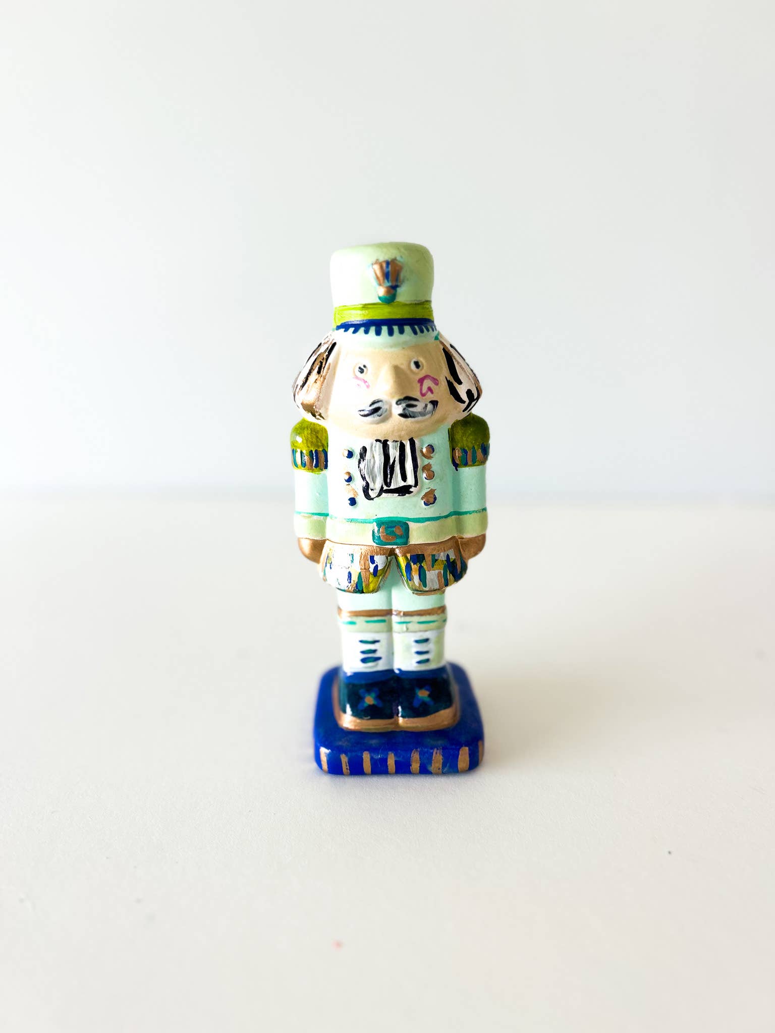 Hand Painted Mint Ceramic Nutcracker – Catherine Campbell